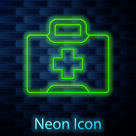 Glowing neon line First aid kit icon isolated on brick wall background ...