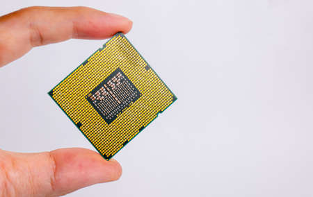 The finger holding the cpu shows the contact face that connects to the ...