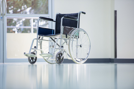 Wheelchairs in the hospital,patient is sitting in a wheelchair,He holds ...
