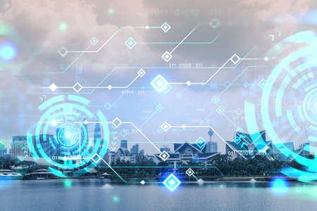 Technology hologram over panorama city view of Kuala Lumpur. KL is the ...