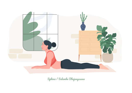 sphinx pose Yoga pose. Young woman practicing yoga exercise. Woman ...