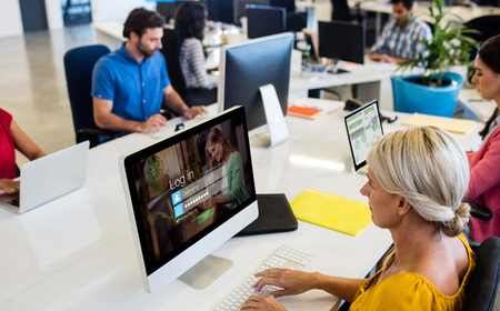 Login screen with smiling woman with pad and coffee against high angle ...