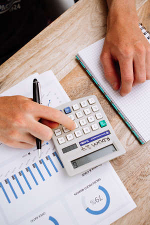 A close up shot business study essentials on a white desk - work and ...