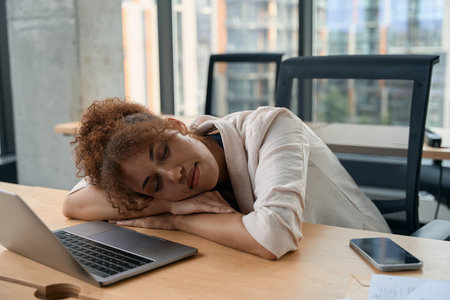 Tired female entrepreneur dozing off at work - Stock Image - Everypixel