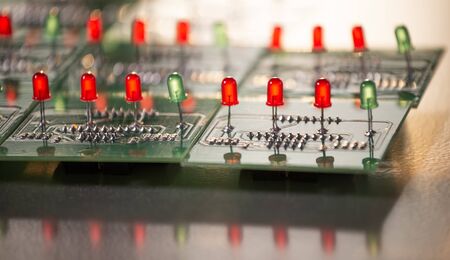 Close-up of a panel with red and green light bulbs indicators on a ...