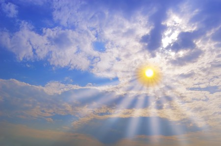 Blue morning sky full of clouds and golden rays of sun - Stock Image ...
