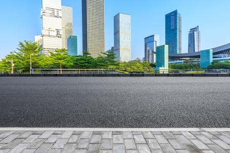 Empty asphalt road and modern city commercial buildings in Shenzhen ...
