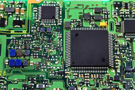 Digital hardware closeup. Microchips assembly on the circuit board ...