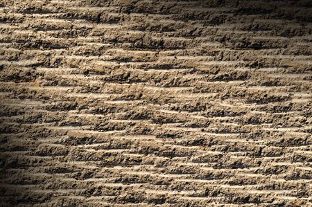Grooved asphalt or rock surface texture lit diagonally - Stock Image ...