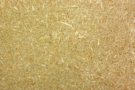 Particleboard - Wood shredded into tiny chips combined with adhesives ...