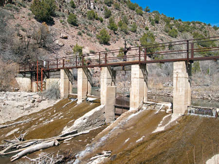 Water flows through the gates of a rural irrigation system. - Stock ...