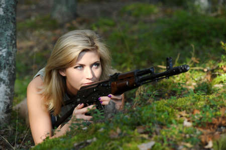 Woman with rifle - Stock Image - Everypixel
