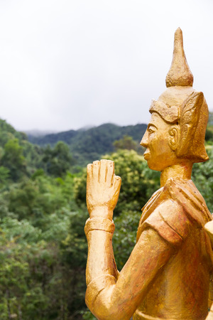 golden god statue pay respect to heaven and earth - Stock Image ...