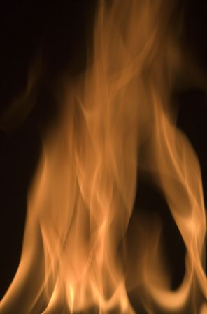 image of red hot fire frozen in time against a black background - Stock ...