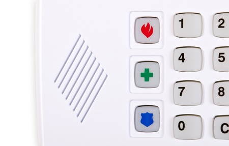 Closeup of home security alarm keypad with fire, police, and medical ...