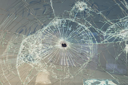 Car with bullet holes in the windshield - Stock Image - Everypixel