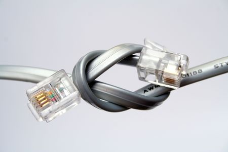 Two telephone cables with tips knotted horizontal - Stock Image ...