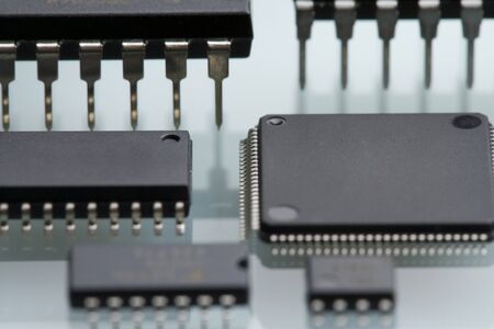 Integrated circuits in row on white background - Stock Image - Everypixel