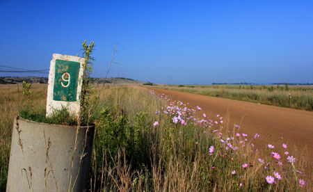 Distance marker on country road - Stock Image - Everypixel