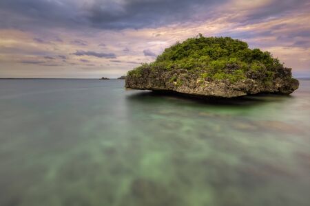 Quezon Island overlooking a floating island at the Hundred Islands ...