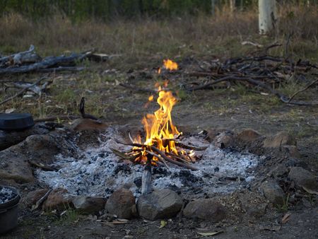 ring of rocks surround the campfire - Stock Image - Everypixel