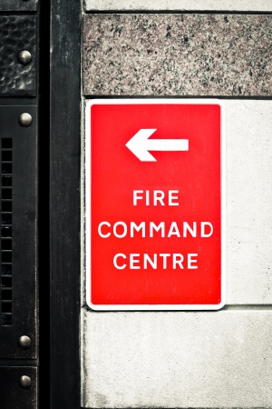 Sign for a fire command centre on a wall - Stock Image - Everypixel