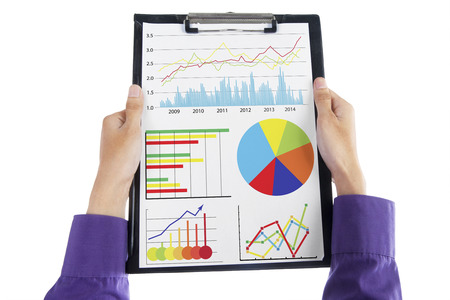 Close-up of graphs and charts analyzed by businessman - Stock Image ...